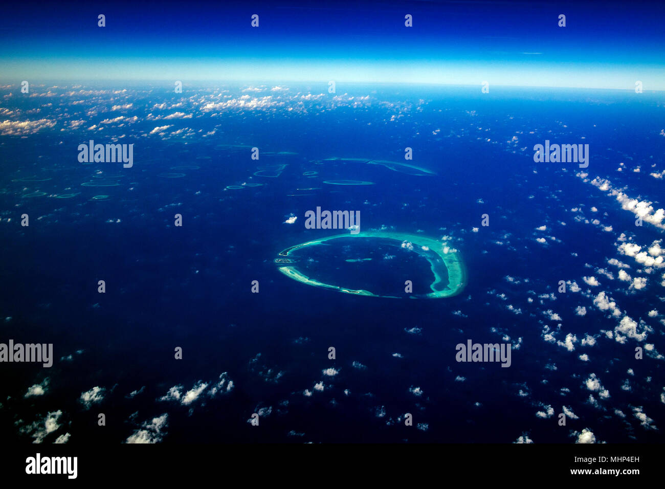 maldives atoll aerial panorama blue water reef Stock Photo - Alamy