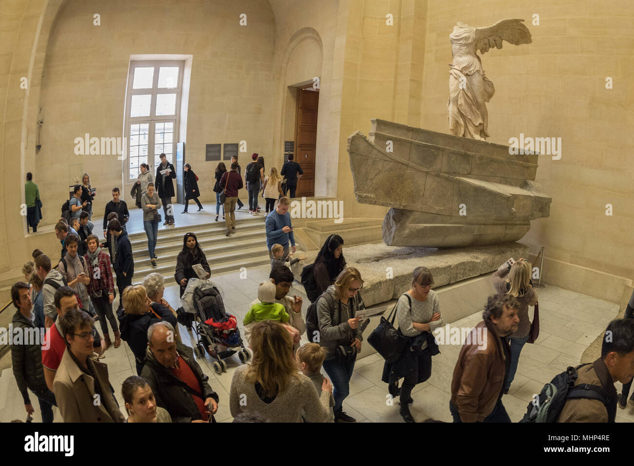 PARIS, FRANCE - APRIL 30, 2016 - Louvre museum crowded of tourist ...