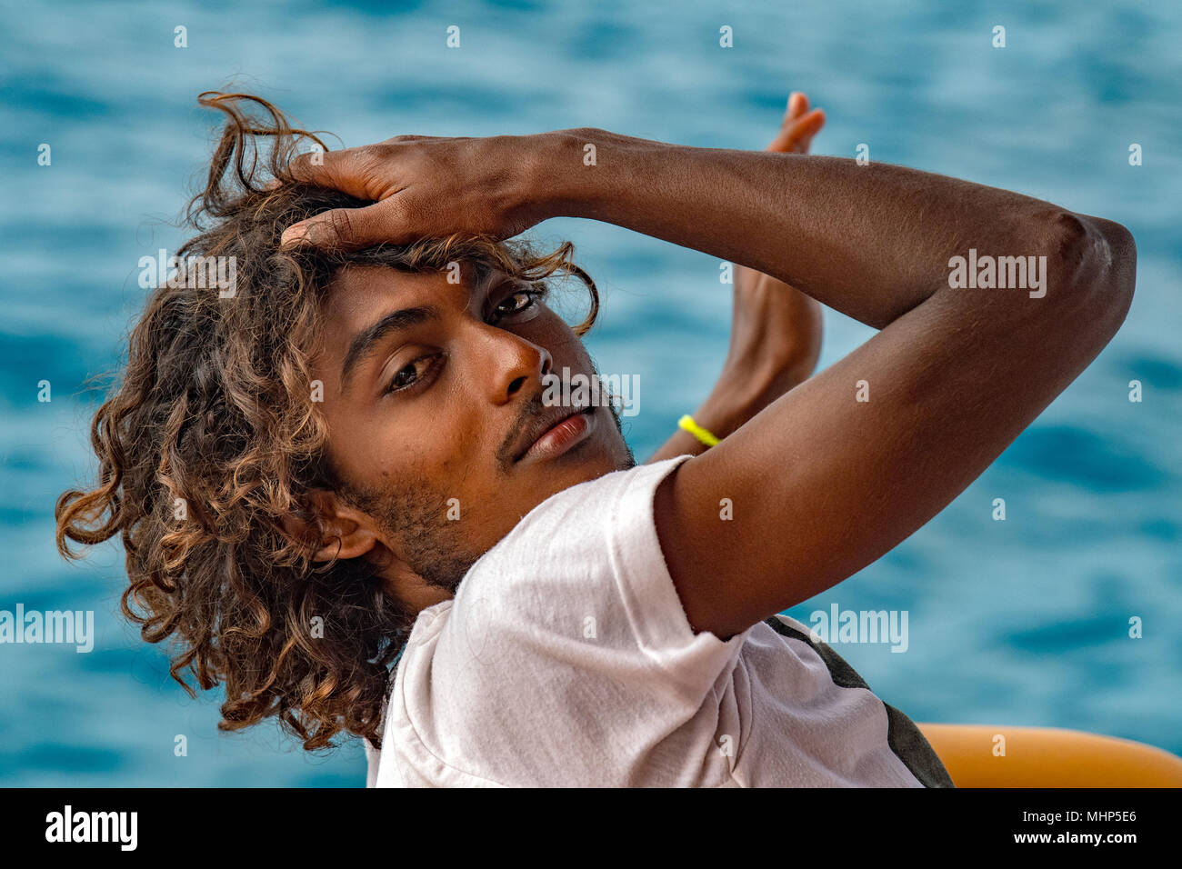Young maldives man portrait looking at you happy and smiling Stock ...