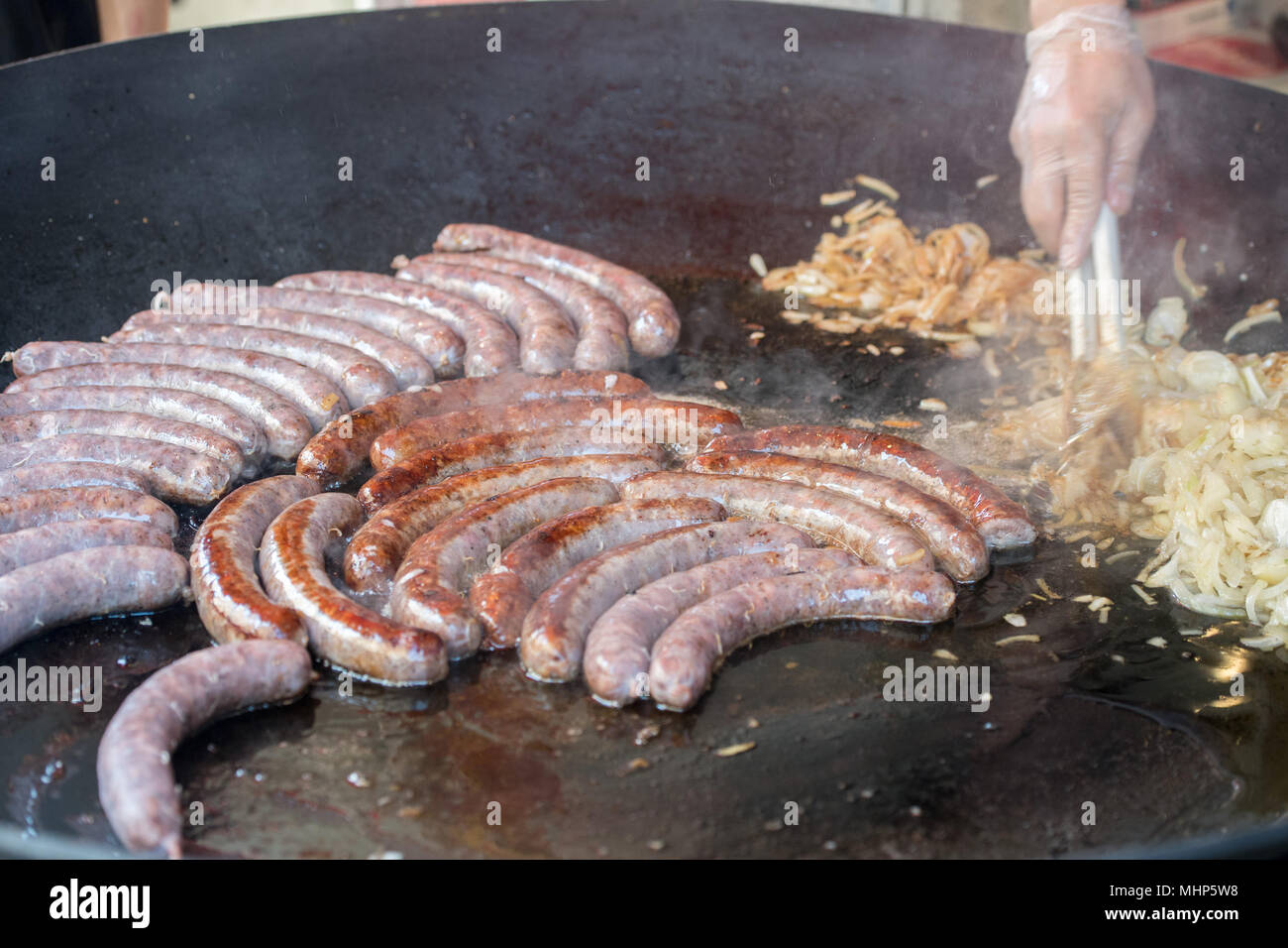 different german Wurstel on barbecue Stock Photo - Alamy