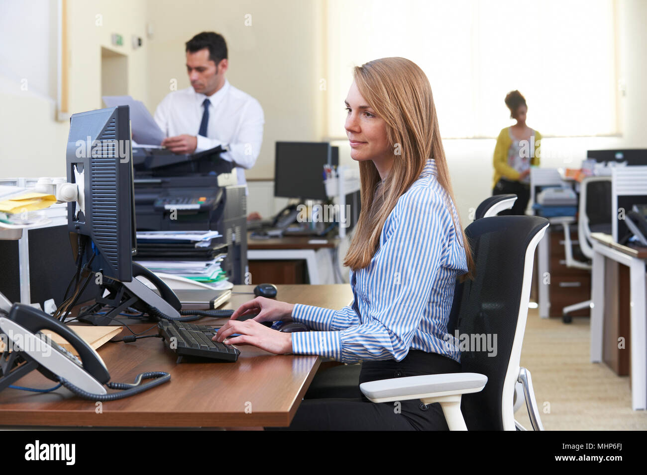 Woman working computer desk hi-res stock photography and images - Alamy