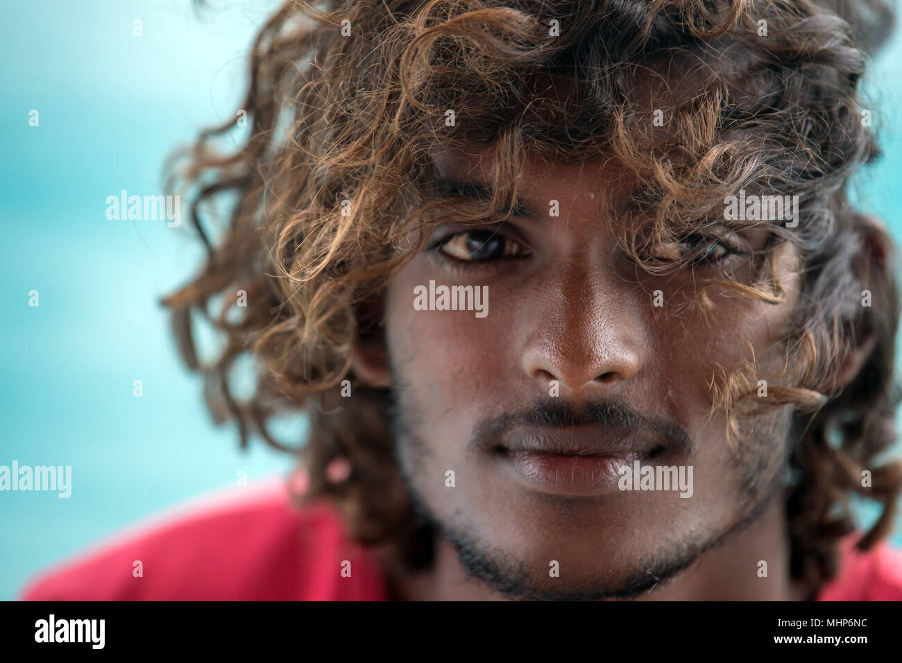 Young maldives man portrait looking at you Stock Photo - Alamy