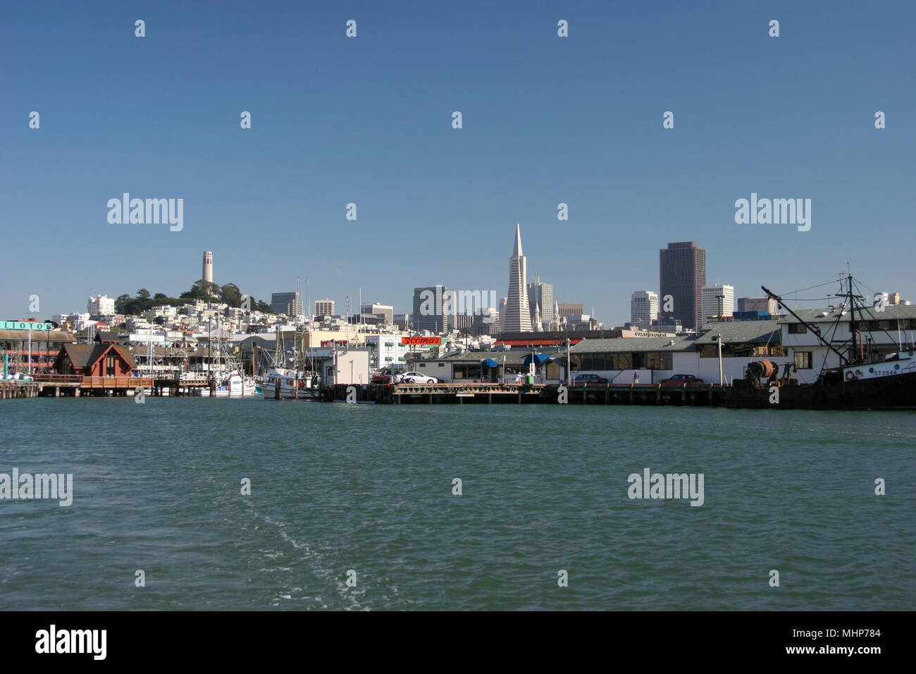 Transamerica Pyramid skyscraper and Coit Tower from the water front San ...