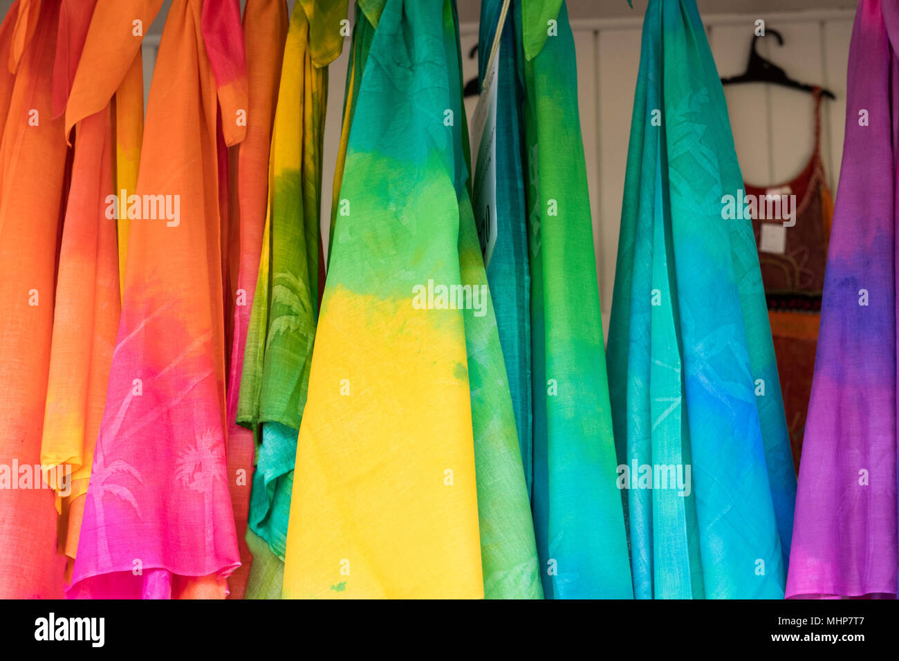 colorful pareo and polynesian dress for sale at the market Stock Photo ...