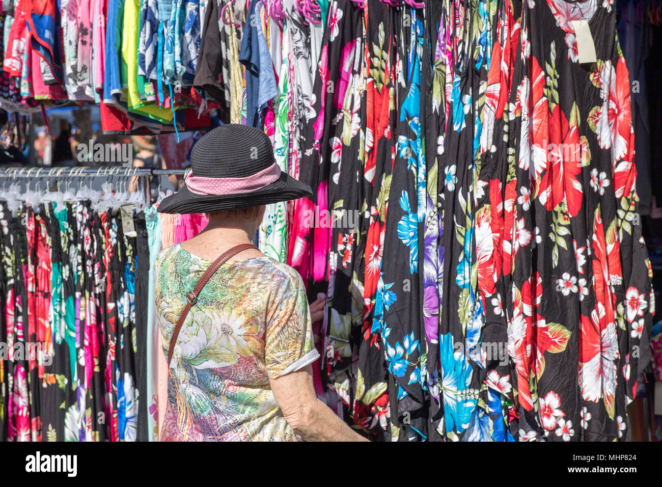 colorful pareo and polynesian dress for sale at the market Stock Photo ...