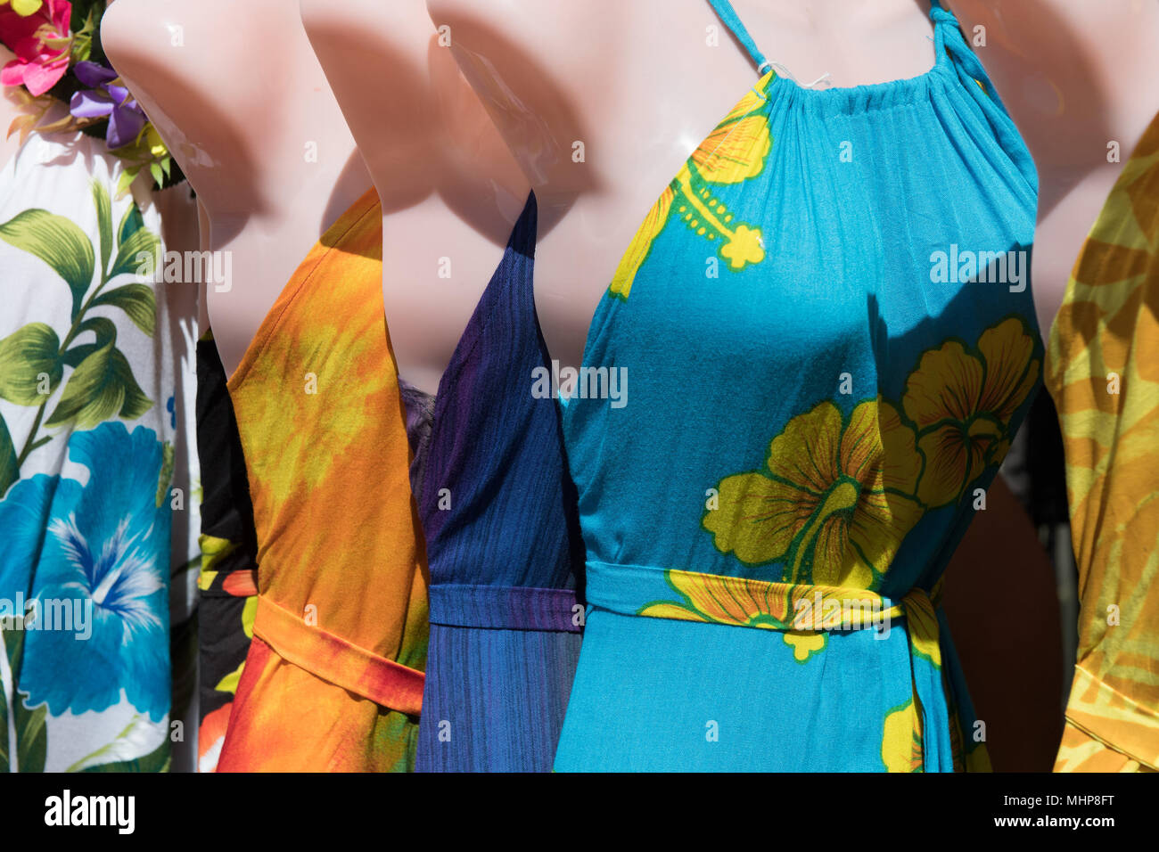 colorful pareo and polynesian dress for sale at the market Stock Photo ...