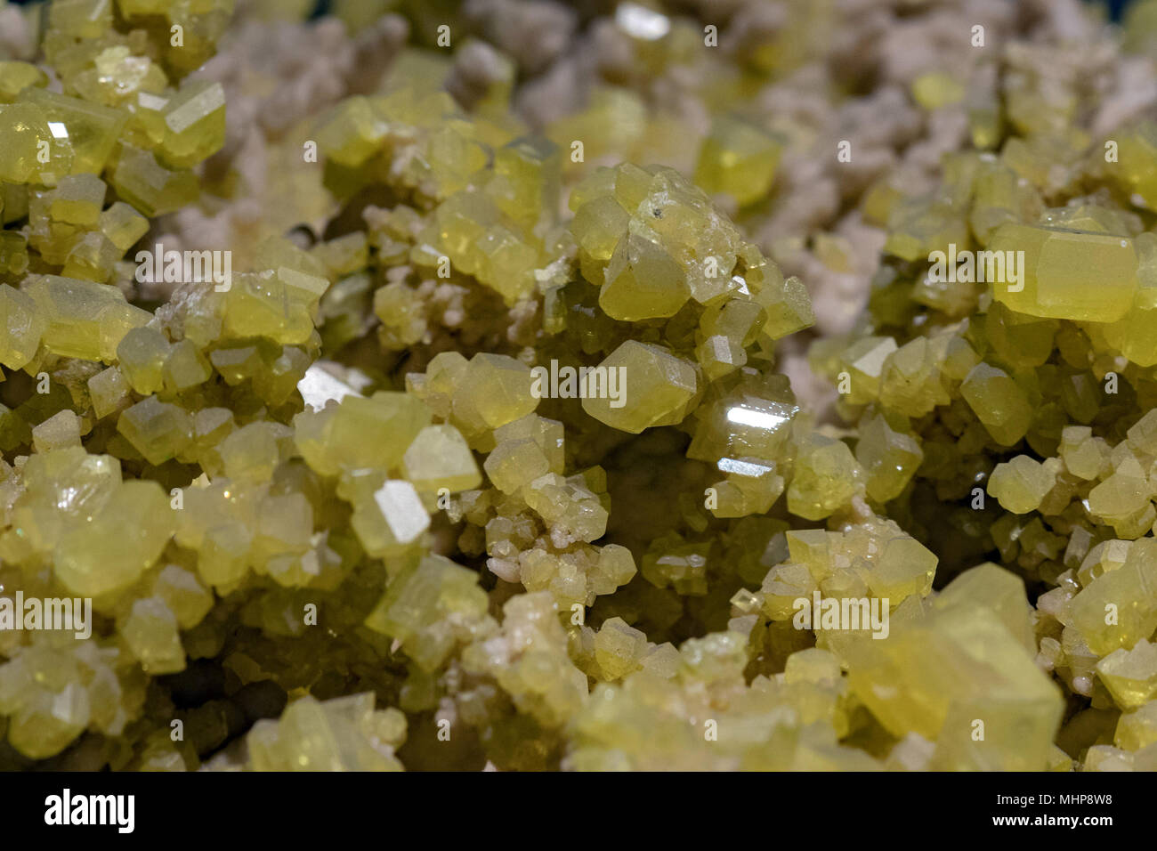 Aragonite rock with yellow sulfur macro Stock Photo - Alamy
