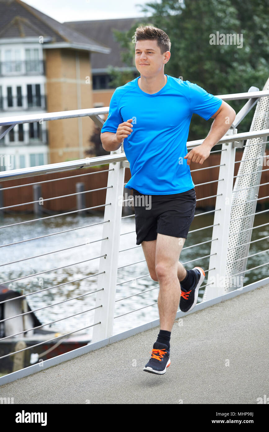 Close up young man running hi-res stock photography and images - Alamy