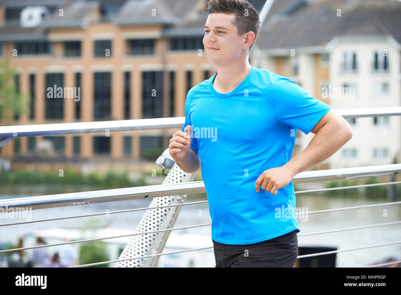 Close up young man running hi-res stock photography and images - Alamy