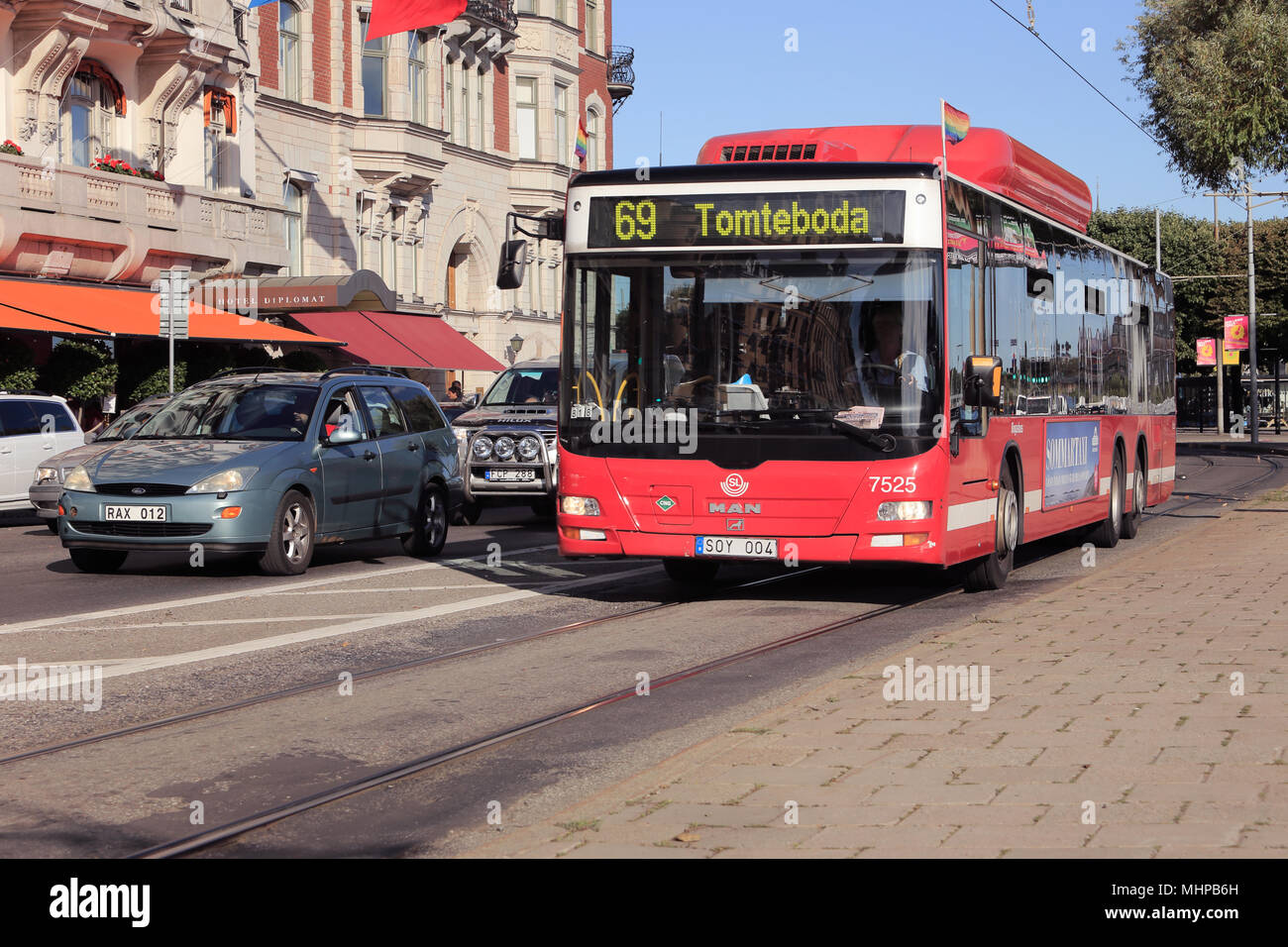 Stockholm, Sweden - August 2, 2013: A red Biogas-powered bus MAN A26 ...
