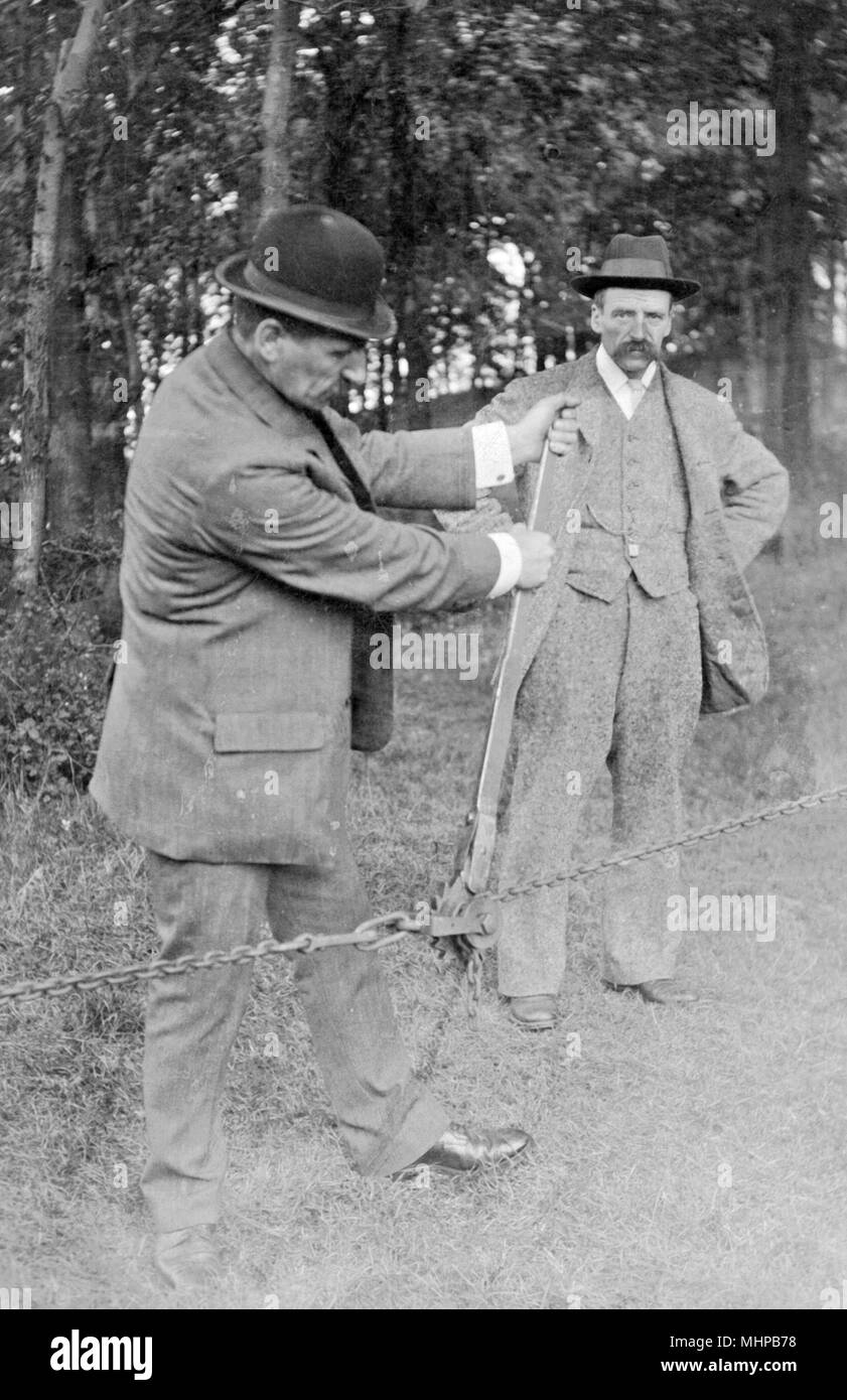 Coal mine owner demonstrating the use of a Sylvester ratchet to remove ...