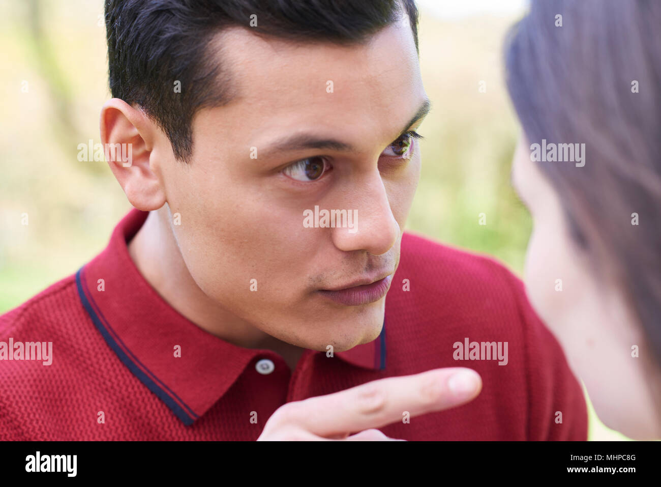 Outdoor Shot Of Young Couple Having Argument Stock Photo - Alamy