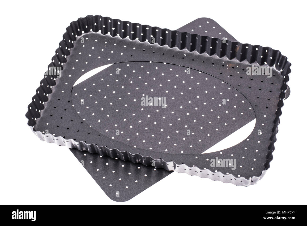 Metal perforated forms for baking. Studio Photo Stock Photo - Alamy
