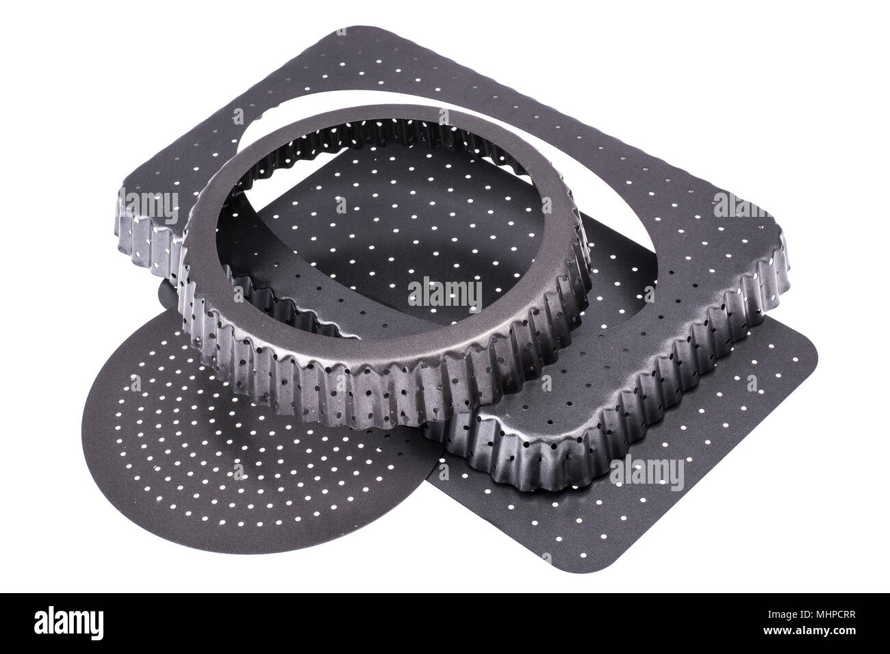 Metal perforated forms for baking. Studio Photo Stock Photo - Alamy