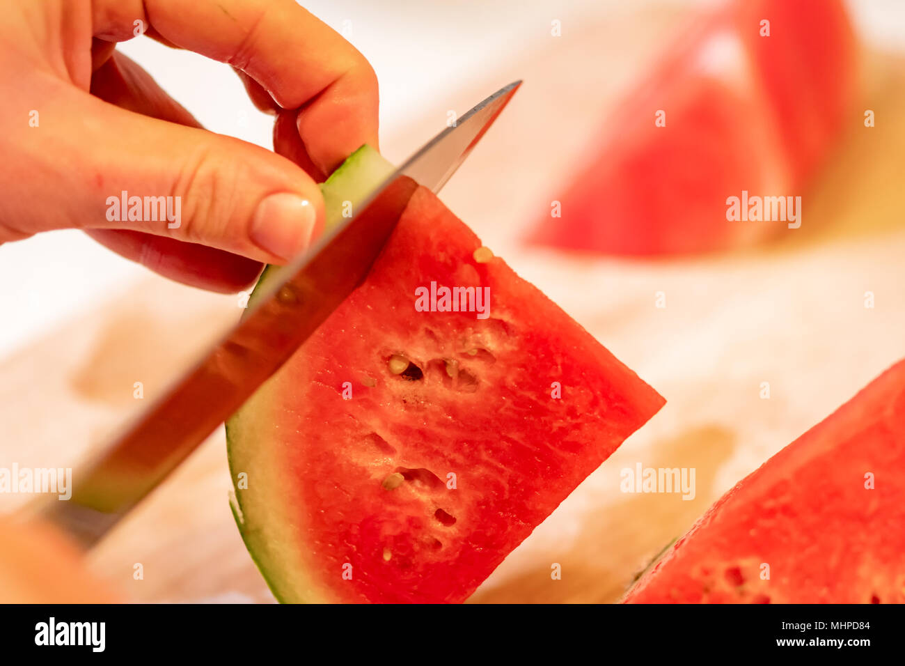 Slicing watermelon knife hi-res stock photography and images - Alamy