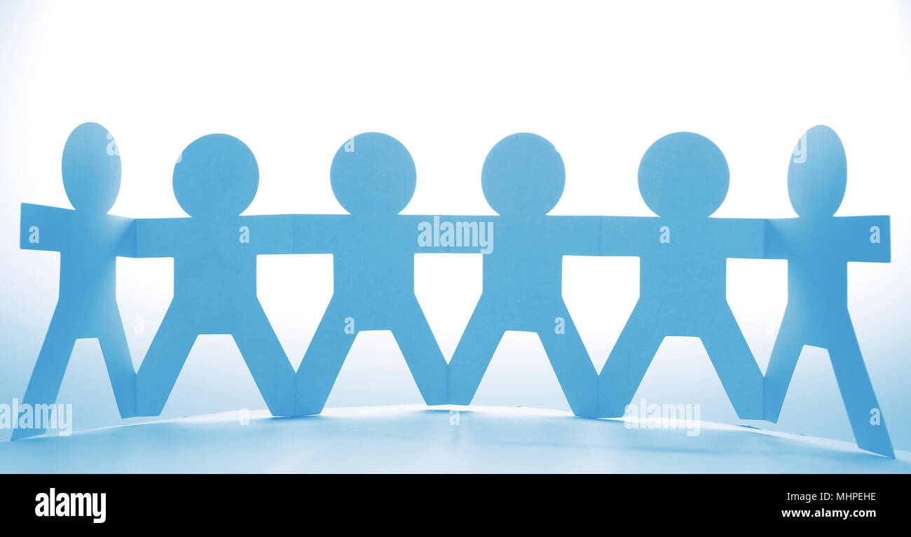 Team of paper chain people Stock Photo - Alamy