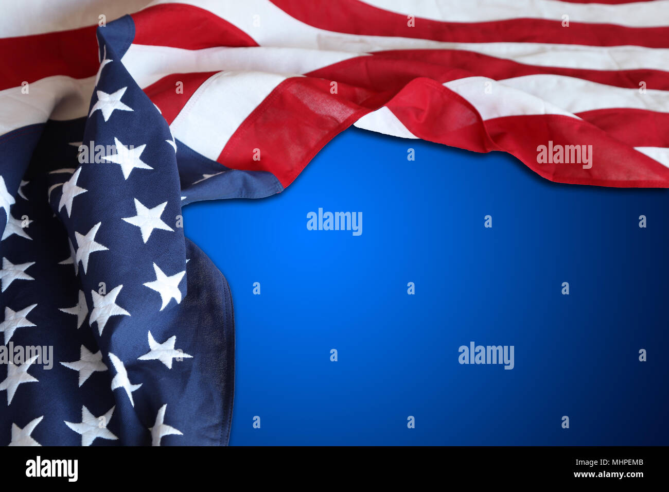 American flag on blue background Stock Photo - Alamy
