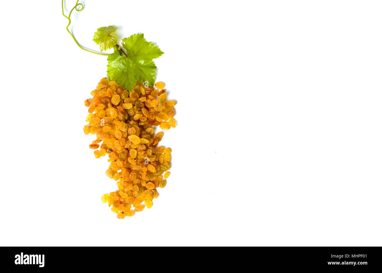 Raisins shaped as grape cluster isolated on white Stock Photo - Alamy
