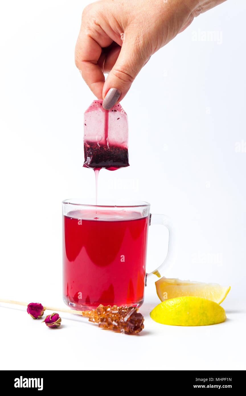 Woman taking tea bag hi-res stock photography and images - Alamy