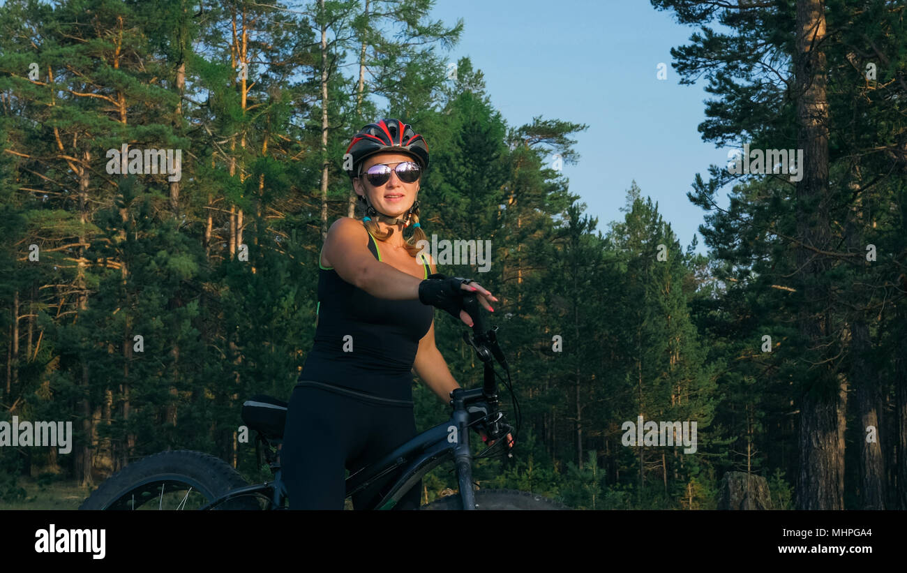 Fat bike also called fatbike or fat-tire bike in summer riding in the ...