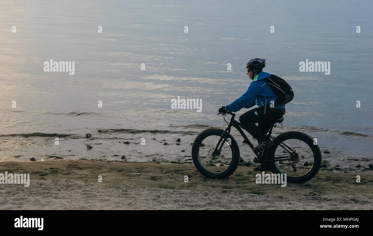 Fat bike also called fatbike or fat-tire bike in summer driving on the ...