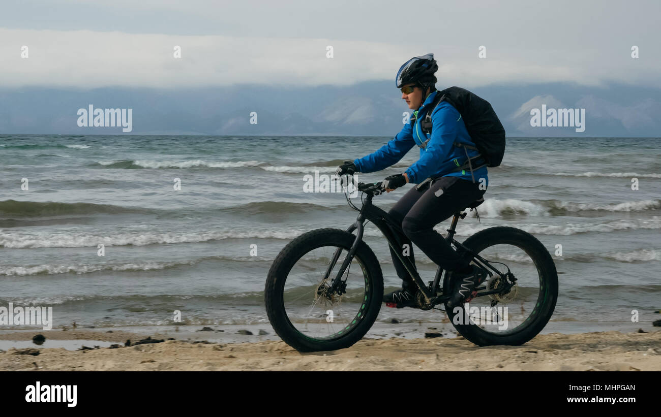 Fat bike also called fatbike or fat-tire bike in summer driving on the ...