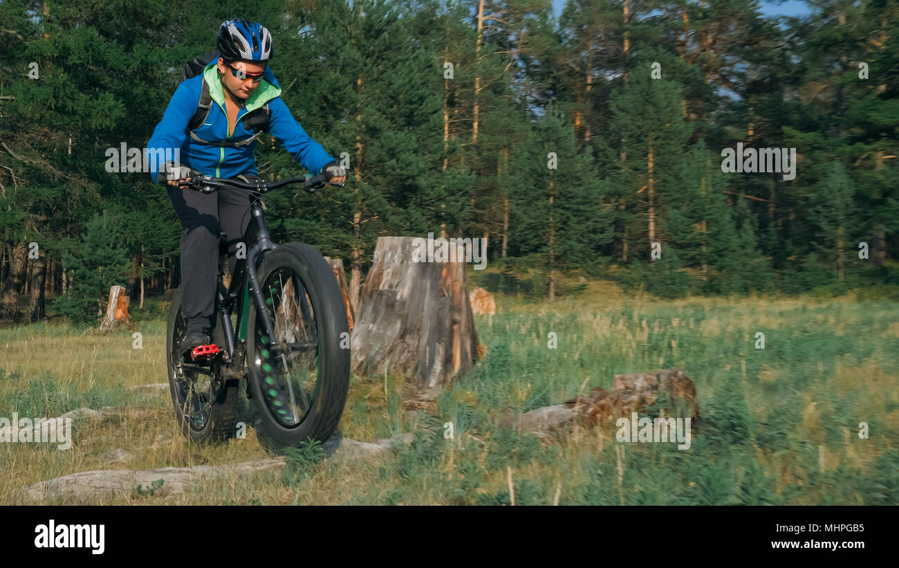 Fat bike also called fatbike or fat-tire bike in summer riding in the ...