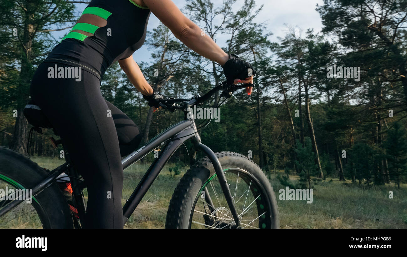 Fat bike also called fatbike or fat-tire bike in summer riding in the ...
