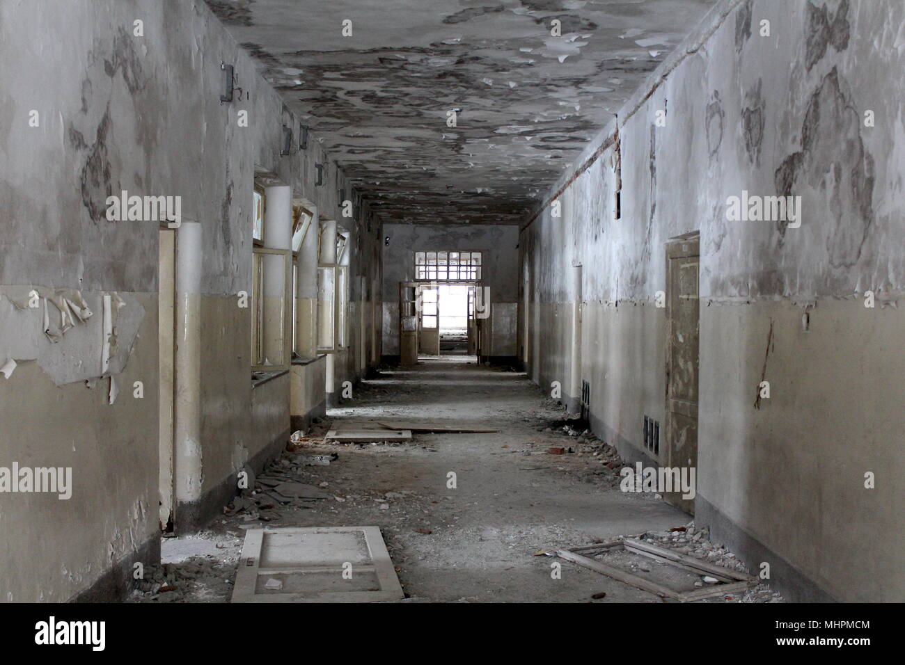 Abandoned building dilapidated corridor with broken doors, windows ...