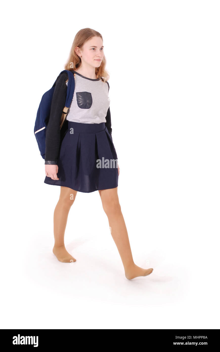 Portrait of teenager girl with school backpack isolated on white ...