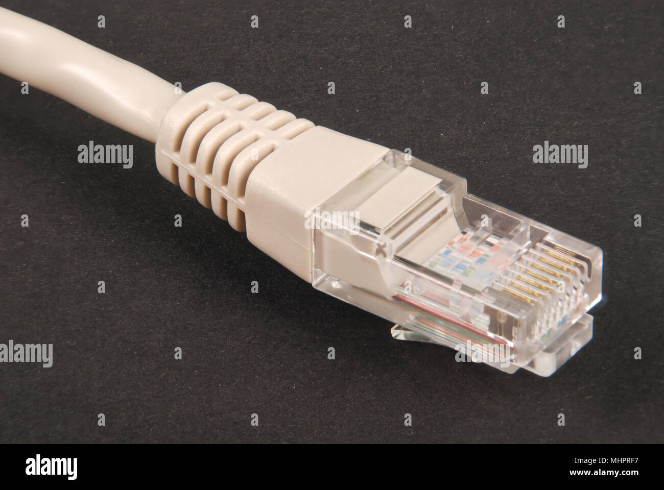 Lan cable and connector RJ45, isolated on black background Stock Photo ...