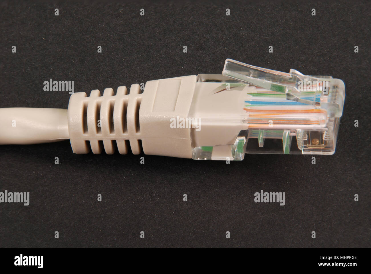 Lan cable and connector RJ45, isolated on black background Stock Photo ...