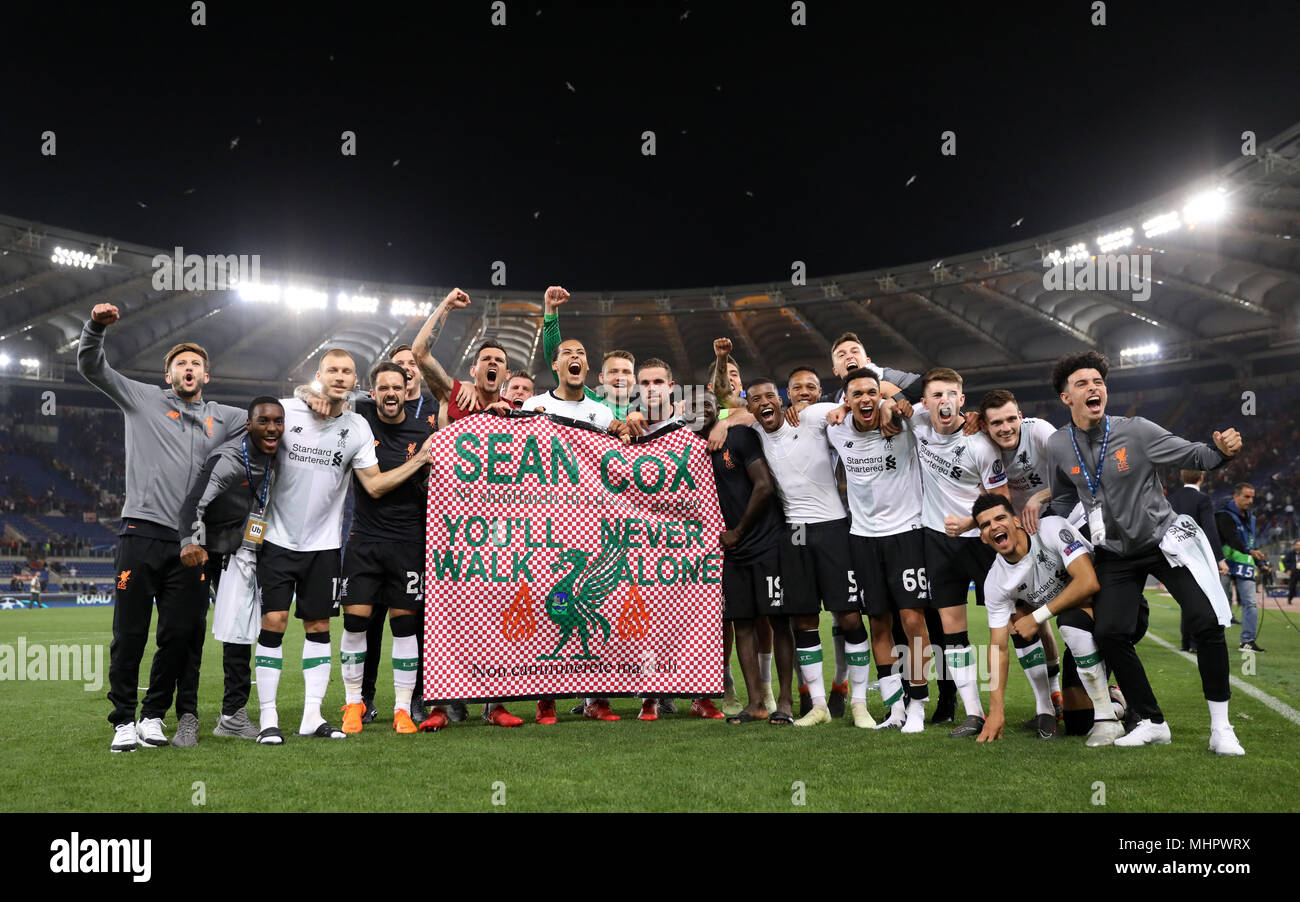 Liverpool celebrate reaching the Champions League Final, with a banner ...