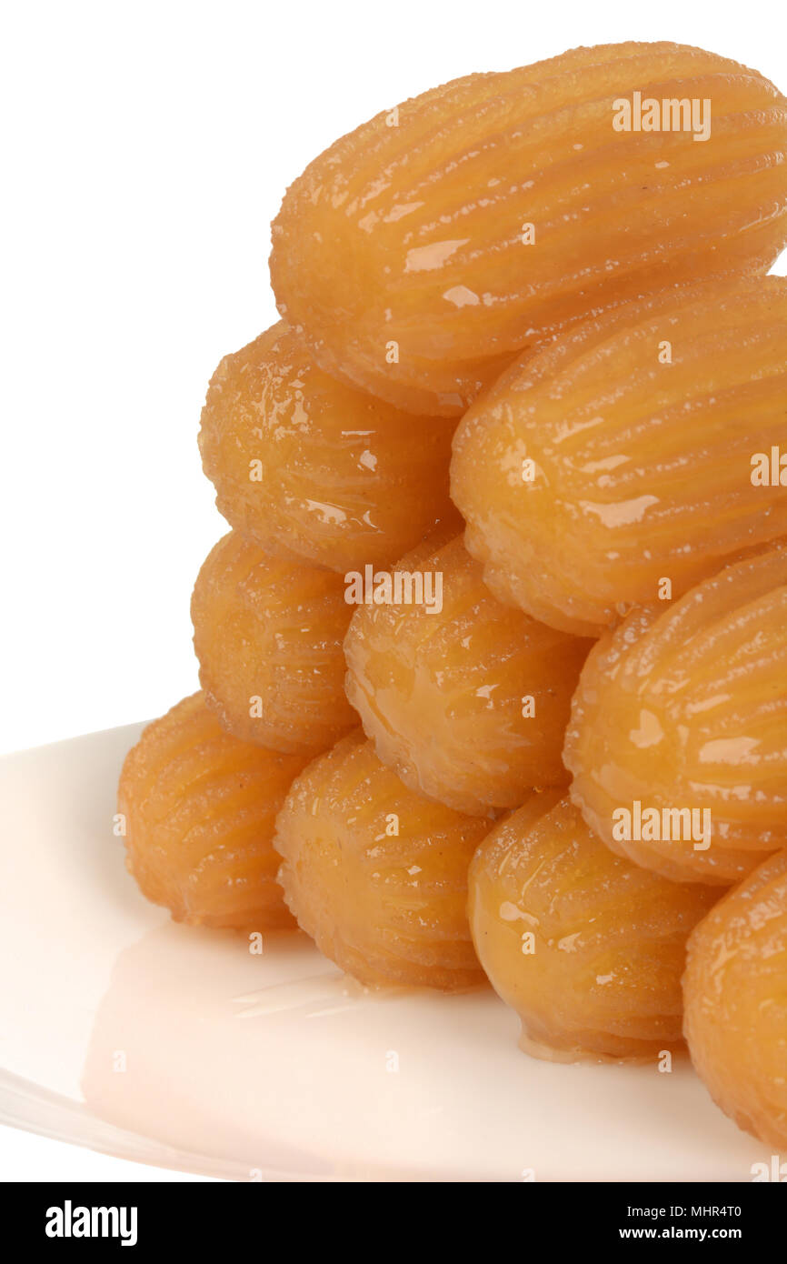 Traditional Turkish dessert tulumba on plate Stock Photo - Alamy