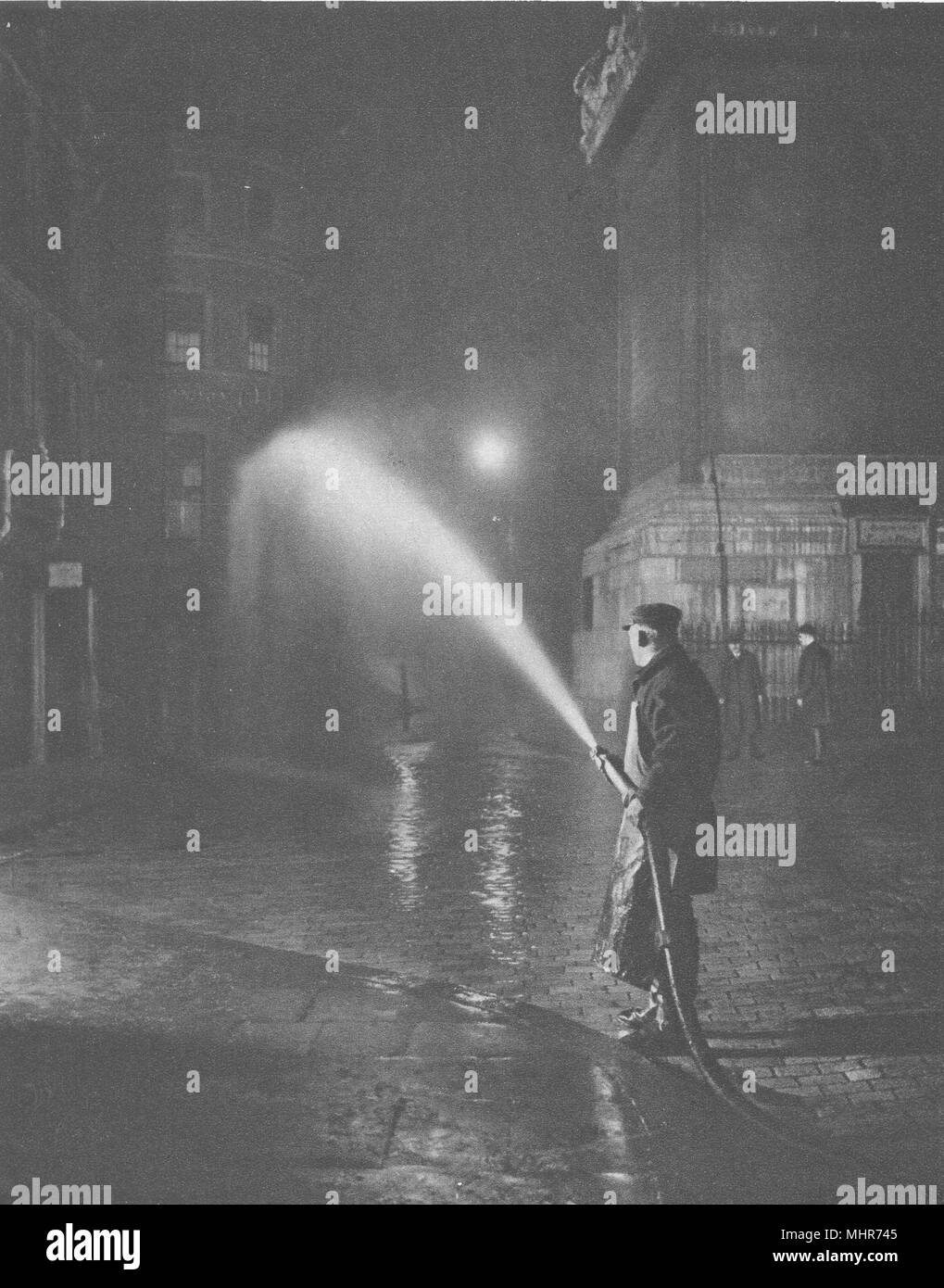 LONDON. London's Nightly cleansing. Scene at the base of the Monument ...
