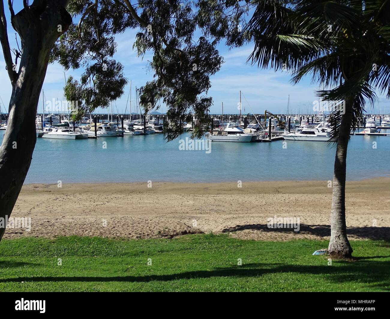 A beach and marina landscape view Stock Photo - Alamy