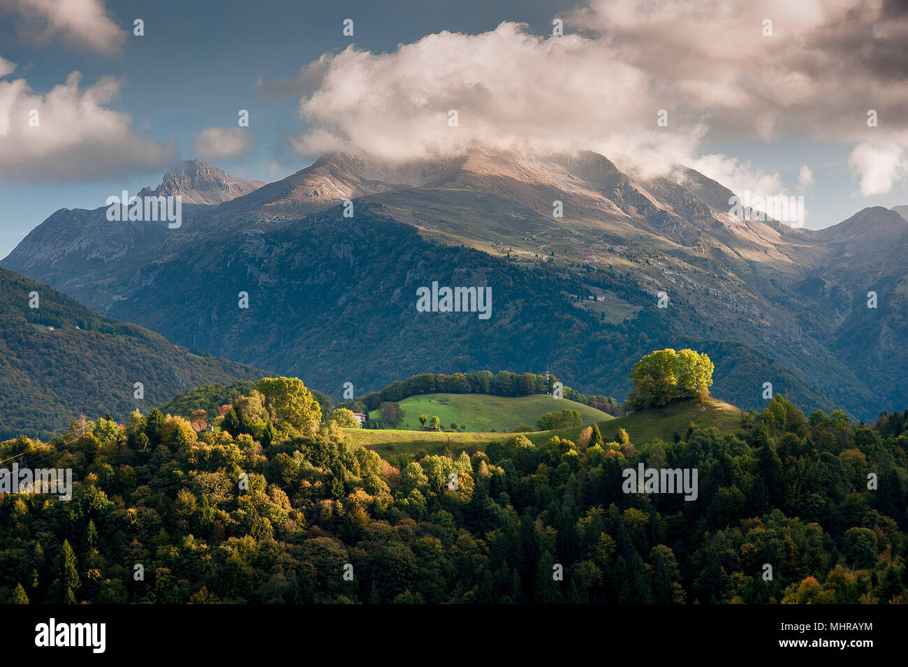 Mount Arera with clouds in the fall Stock Photo - Alamy