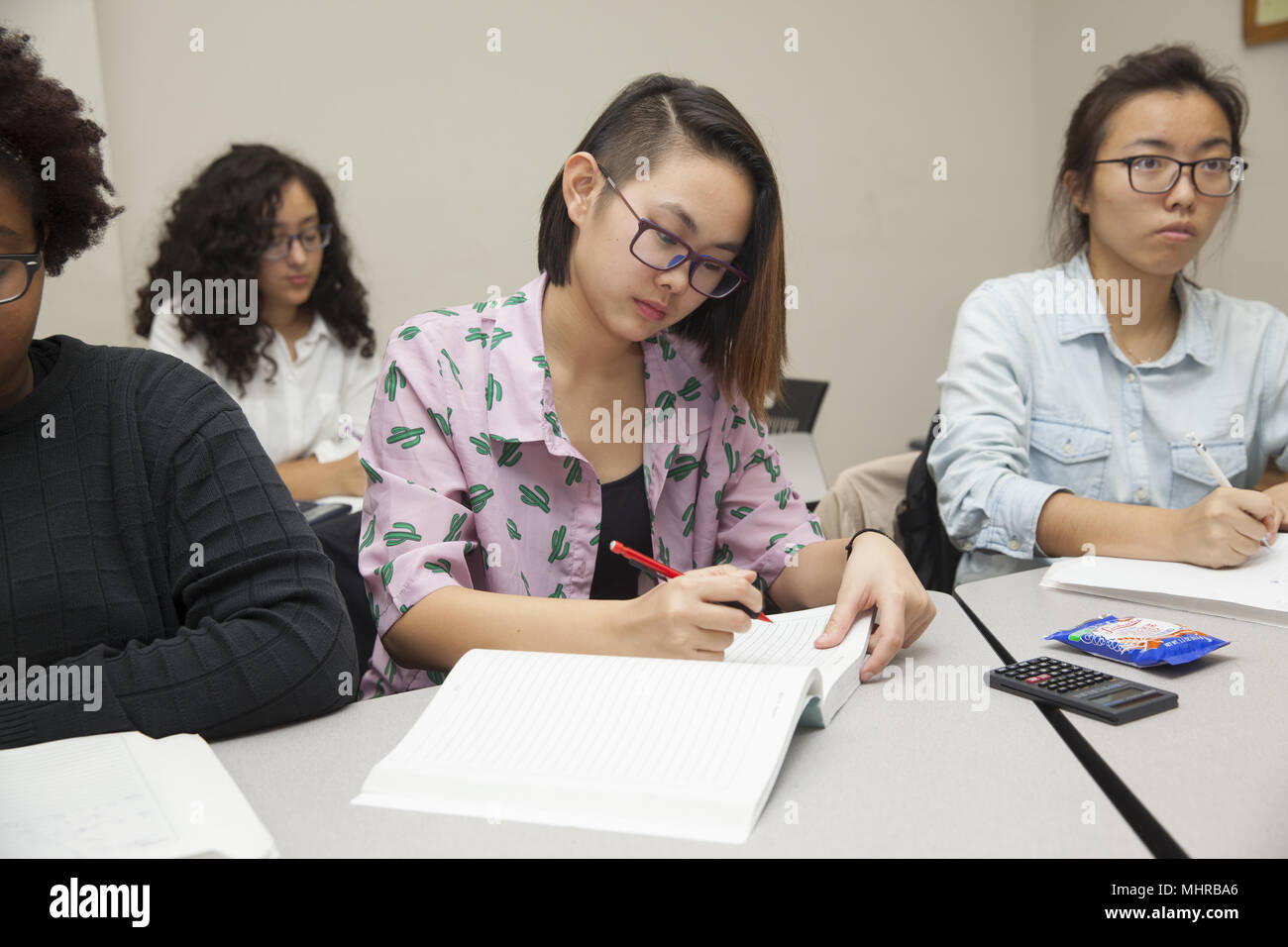College bound high school students participate in a College Now program ...