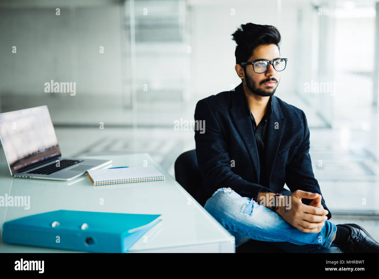 Man Working At Computer In Contemporary Office Stock Photo - Alamy
