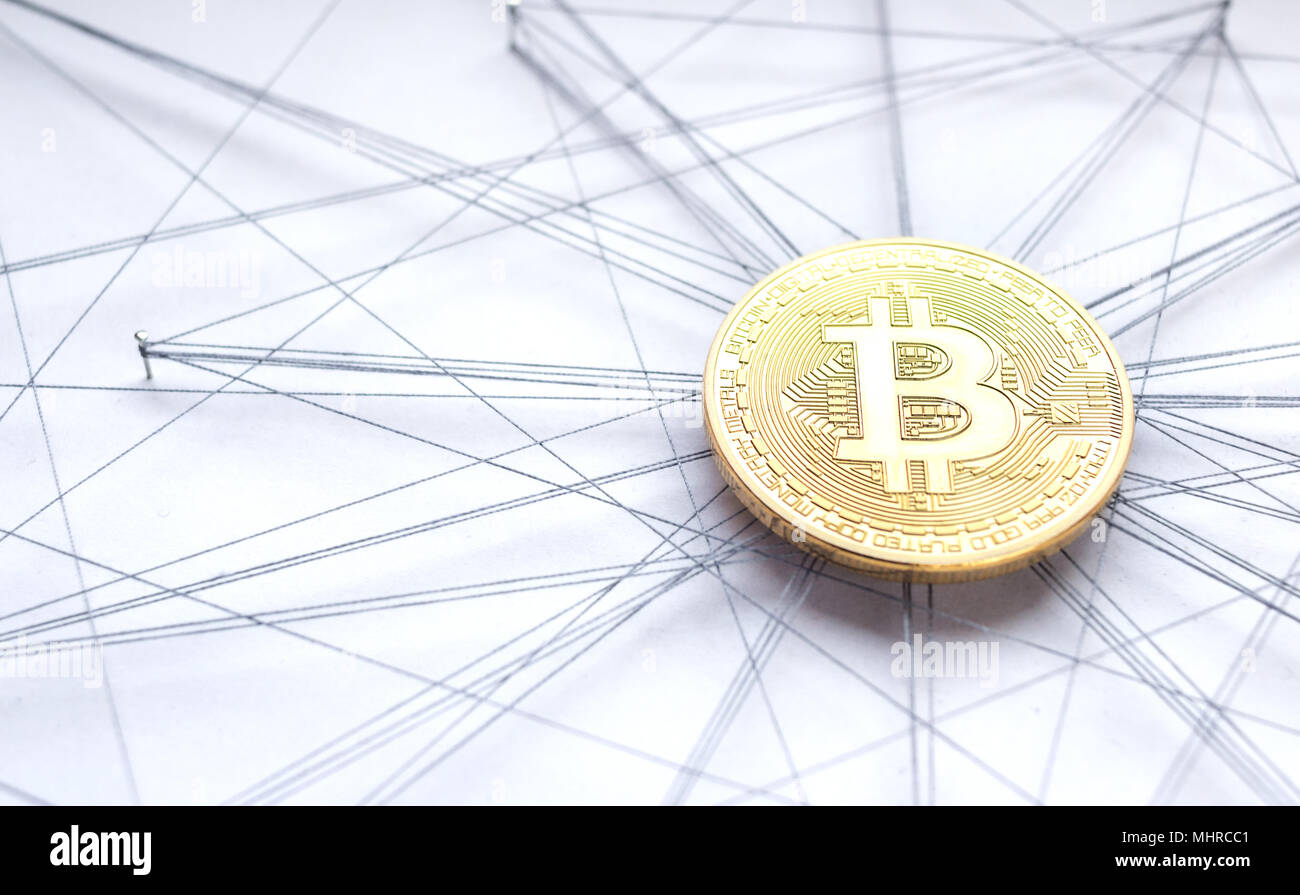 Physical Bitcoin suspended in sewing thread and pins isolated ...