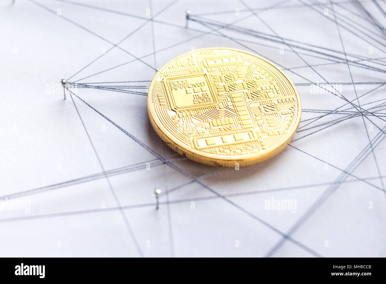 Physical Bitcoin suspended in sewing thread and pins isolated ...