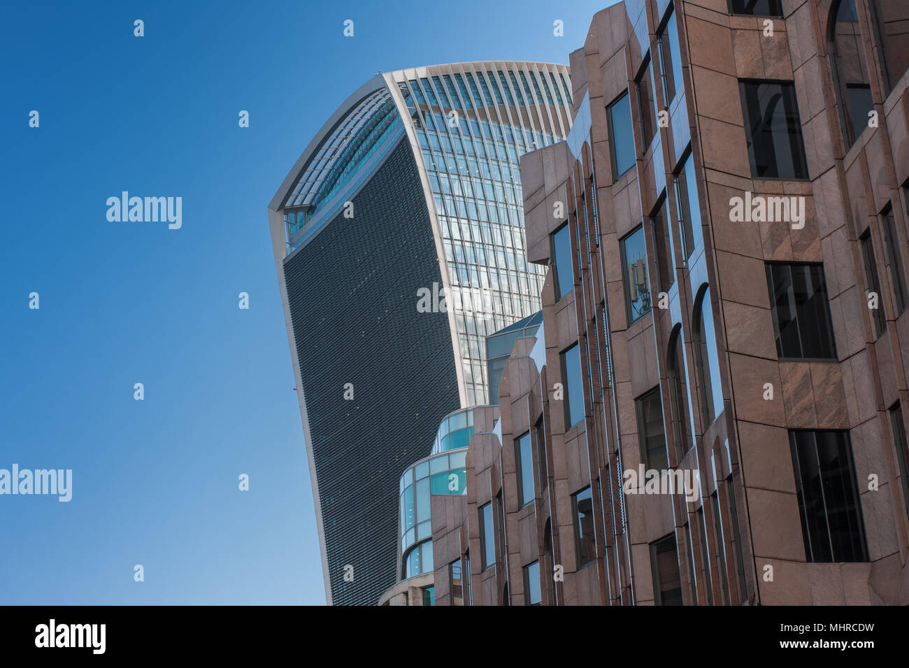 Office building in postmodern gothic style and glass facade of ...