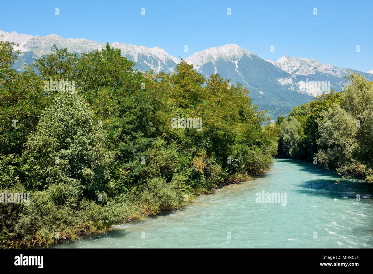 River Inn flows through the trees near Innsbruck, photographed with the ...