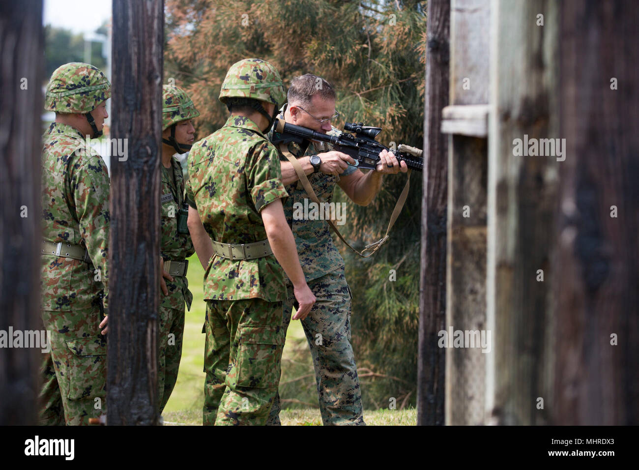 CAMP HANSEN, OKINAWA, Japan – A Marine demonstrates the capabilities of ...