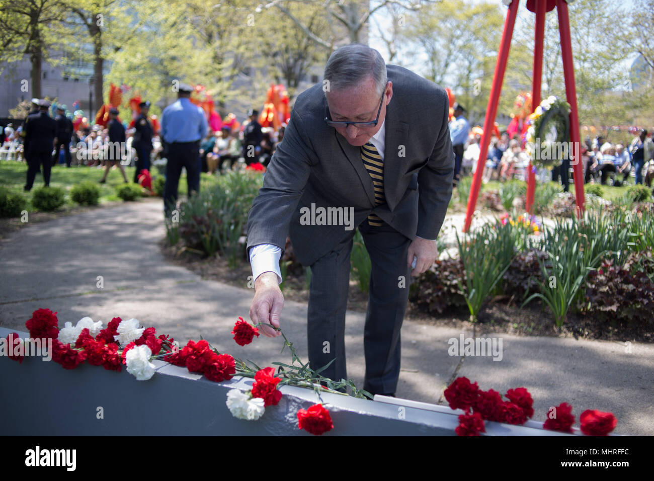 Philadelphia, USA. 2nd May 2018. Mayor Jim Kenney lays a flower to ...