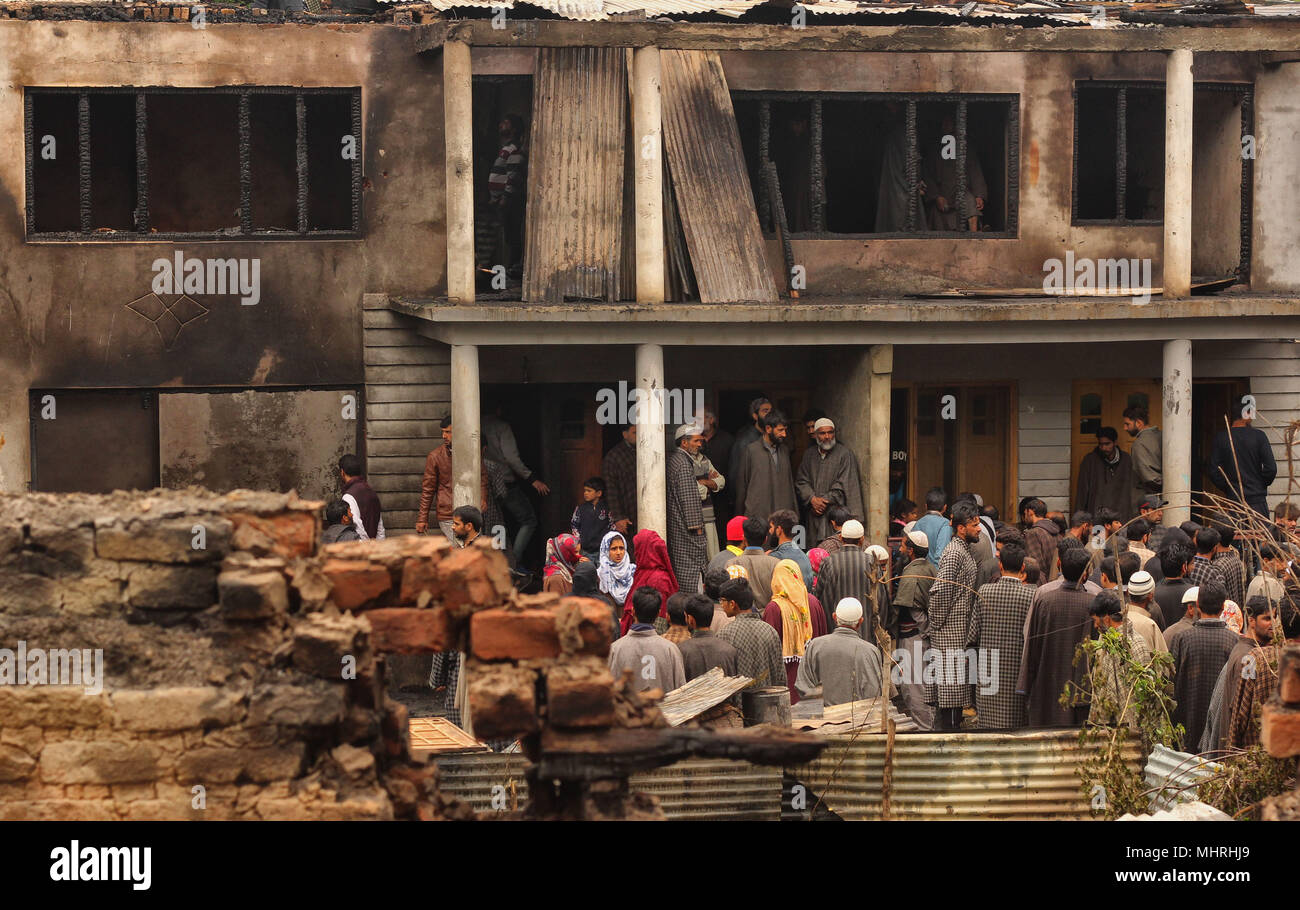 Shopian, Jammu and Kashmir, 3rd May, 2018. People assemble near the ...