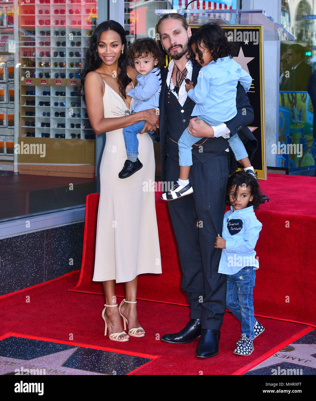 a Zoe Saldana - Star 174 with Marco Perego Saldana + tiwns Cy Aridio ...