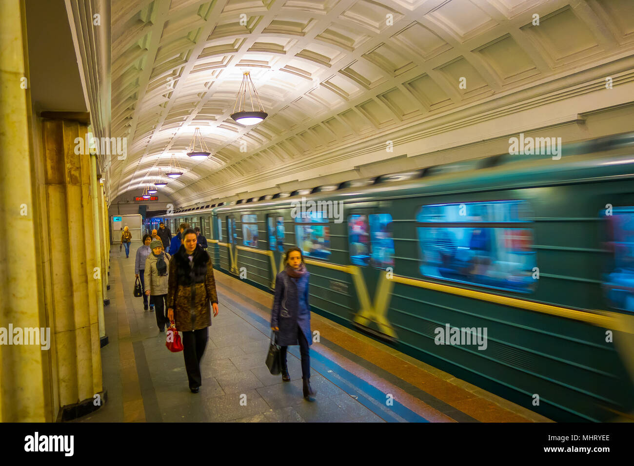MOSCOW, RUSSIA- APRIL, 24, 2018: Blurred people walking in underground ...