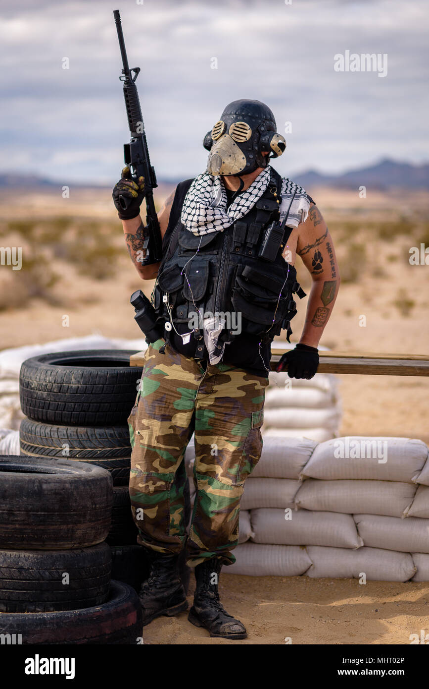 In a post-apocalyptic desert wasteland, a Queen of the Apocalypse leads ...