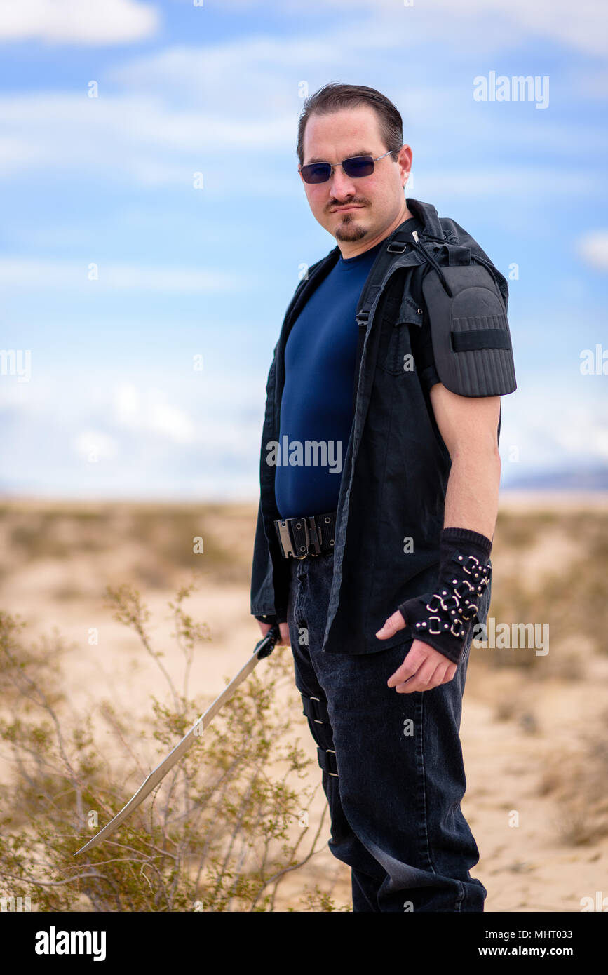 In a post-apocalyptic desert wasteland, a Queen of the Apocalypse leads ...